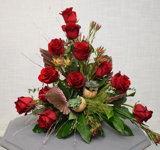Long stemmed Rose and succulent Display
